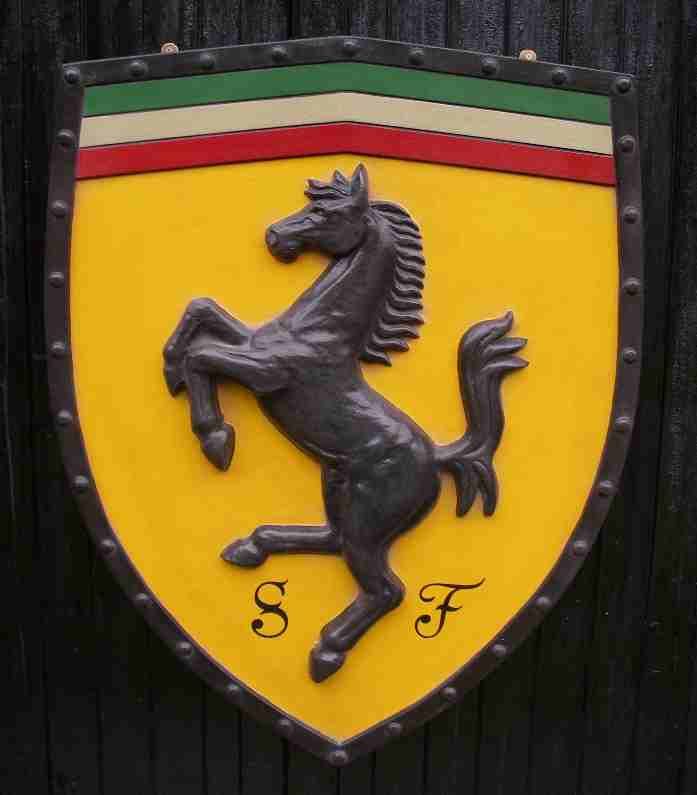 Bonhams Cars : A large Ferrari hand-painted fibreglass shield,