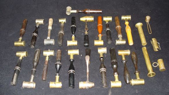 Bonhams : Two tubular brass powder- and shot-measures, and twenty-four ...