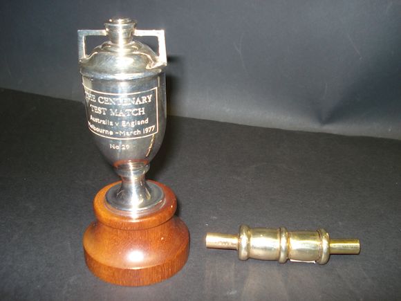 Bonhams : A silver cricket bat, and commemorative Ashes trophy