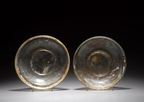 Bonhams : Two Roman green glass plates 2