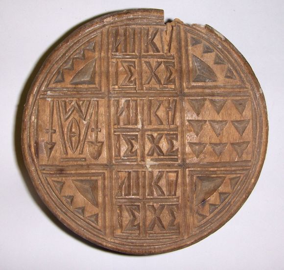 Bonhams : A Coptic wooden bread stamp