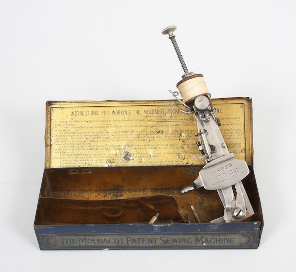 Bonhams : A Moldacot pocket sewing machine
