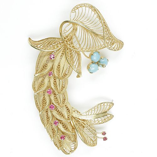 Bonhams : A gem set filigree brooch,