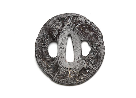 Bonhams : An iron tsuba By Mitsuhiro, Edo Period