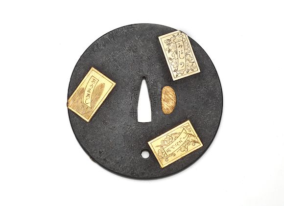 Bonhams : A large iron tsuba By Ikeda Kazuhide, dated 1811