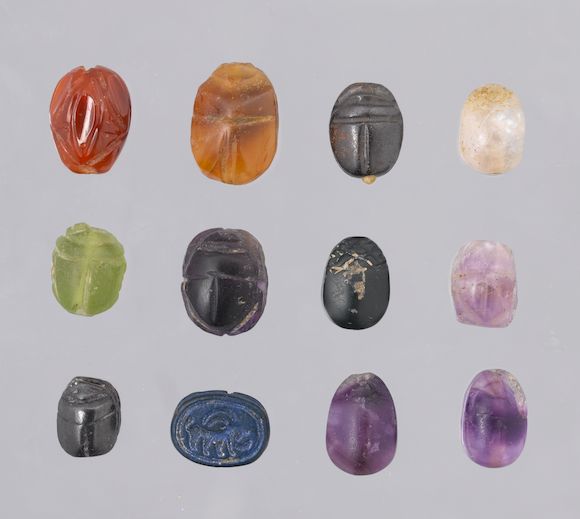 Bonhams : Ten Egyptian hardstone scarabs and two other scarabs, 12