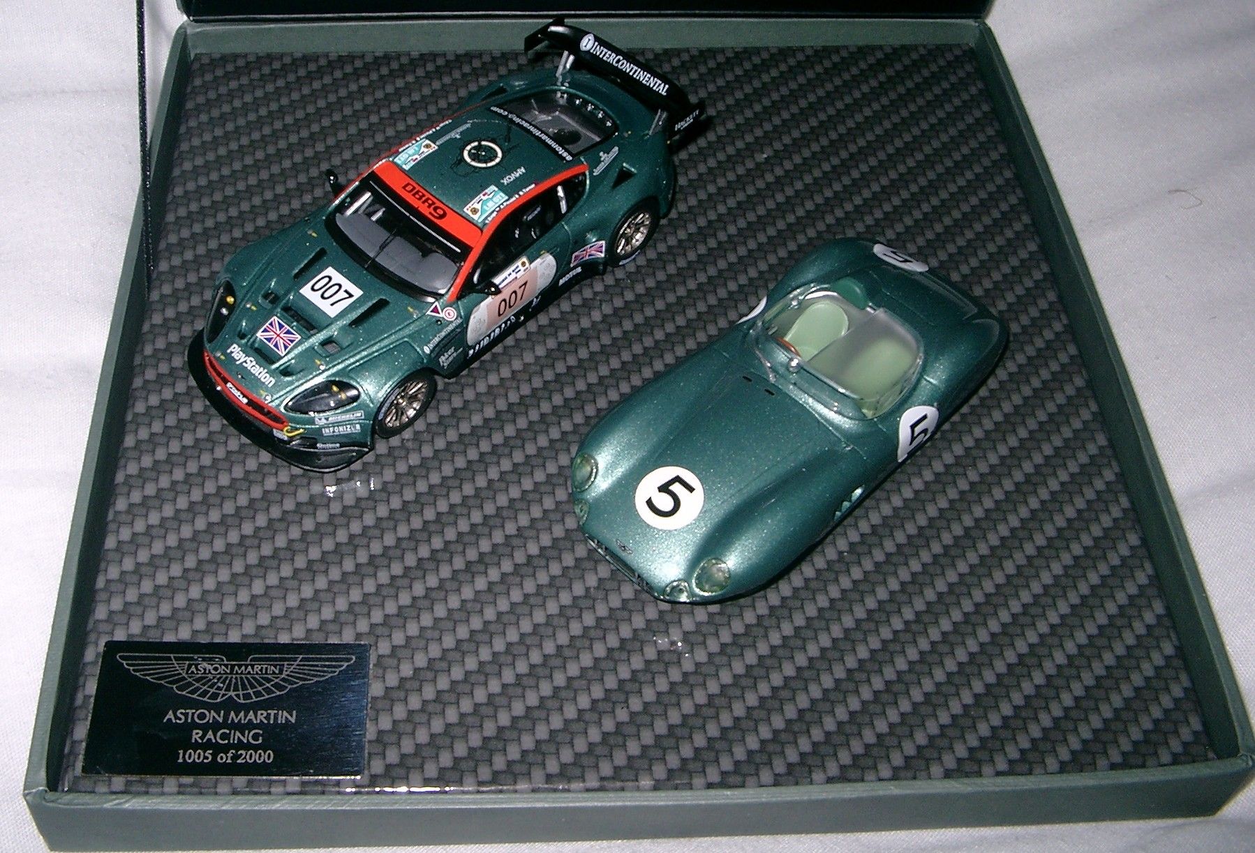 Bonhams Cars : A cased pair of Aston Martin 1:43 scale models,