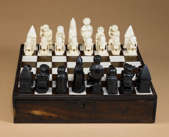 Bonhams : A Tribal ivory and ebony figural chess set, Belgian Congo ...