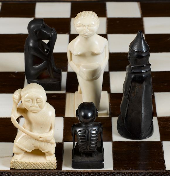 Bonhams : A Tribal ivory and ebony figural chess set, Belgian Congo ...