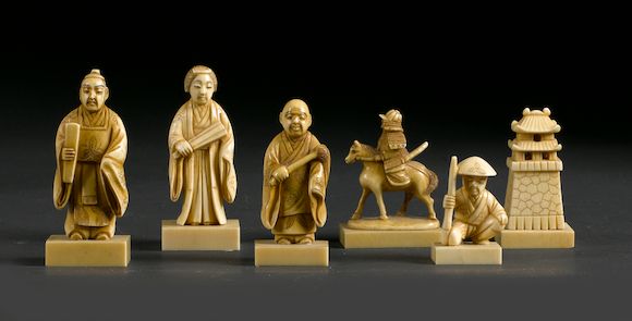 Bonhams : An ivory figural chess set, Japanese, circa 1925,