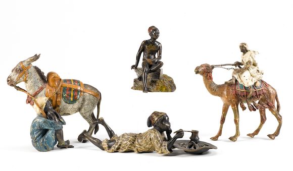 Bonhams : Franz Bergman (Austrian, 1861-1936) A cold painted bronze figure of an Arab boy ...