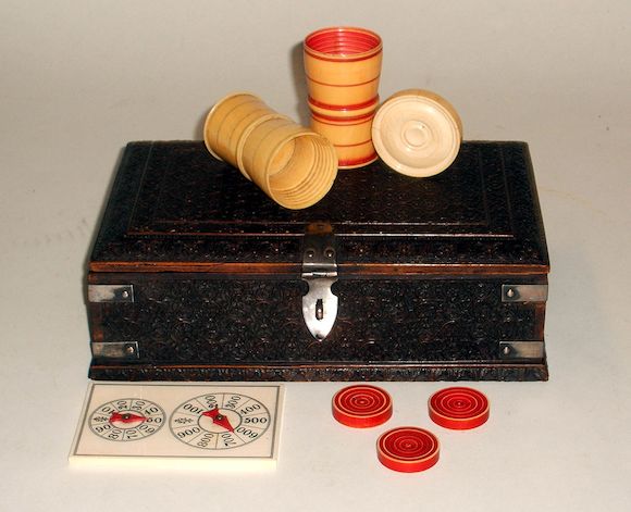 Bonhams : A collection of 19th century backgammon counters and draughts