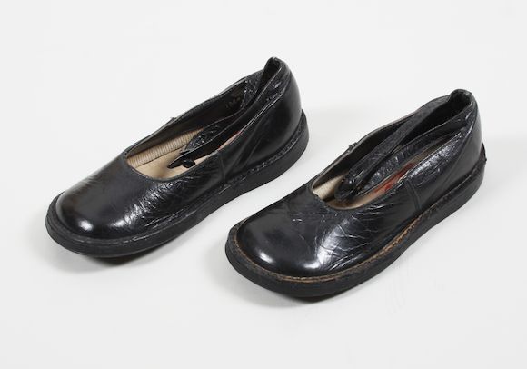 Bonhams : A pair of black leather CC41 childrens shoes