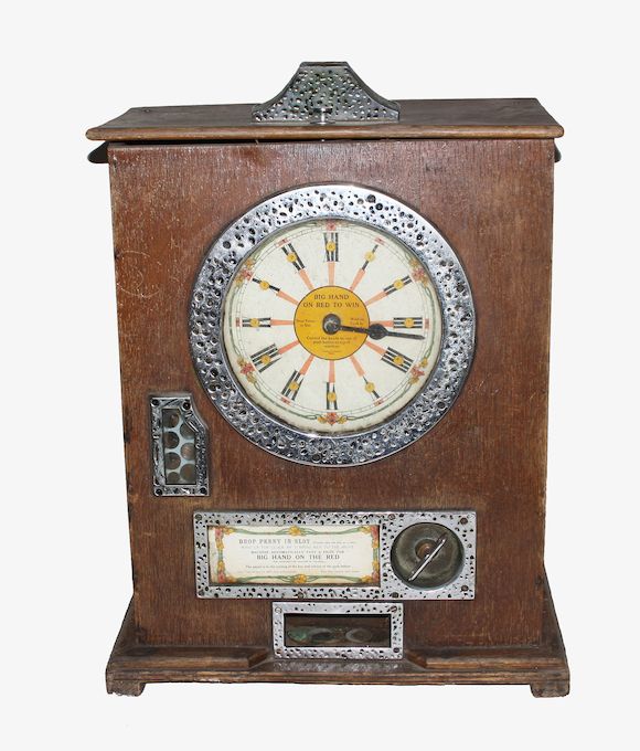 Bonhams : A Bryan's 'Clock' amusement wall machine,