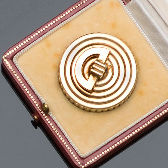 Bonhams : A 9ct gold circular pill box, by Cartier