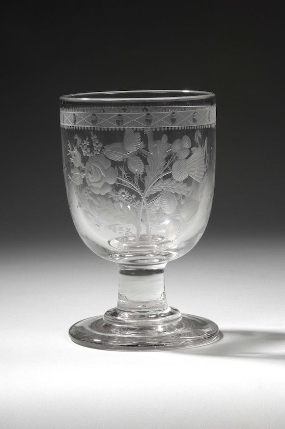 Bonhams : An engraved clear glass loving cup mid 19th Century