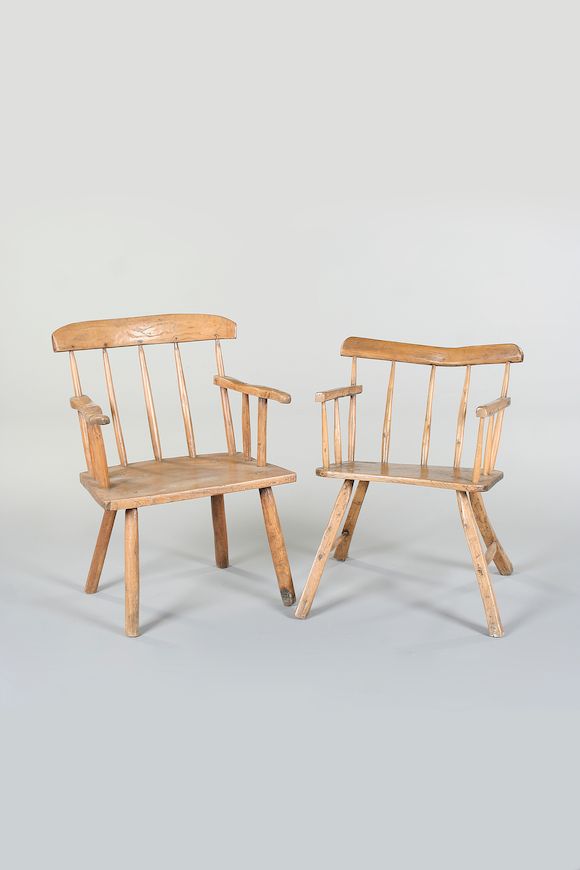 Bonhams : Two Elm Irish Famine style chairs, 19th century,
