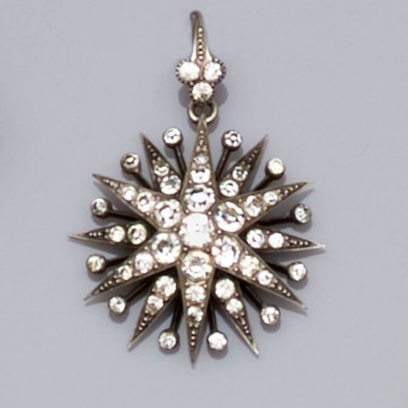 Bonhams : An early 20th century colourless paste star pendant