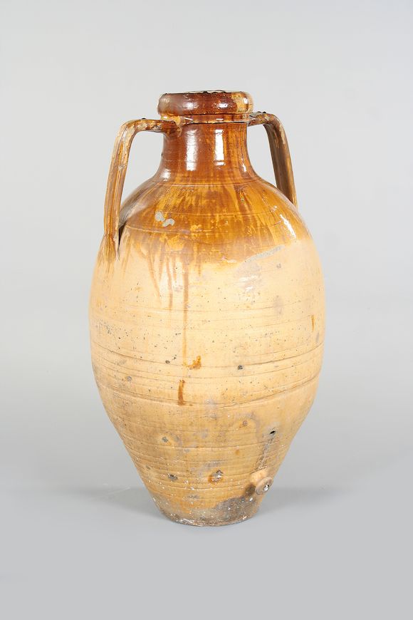 Bonhams : A large treacle glazed stone ware olive oil jar