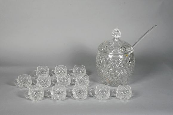 Bonhams : A cut glass punch bowl, ladle and twelve cups early 20th century