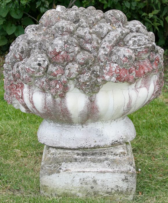 Bonhams : A carved stone basket of fruit