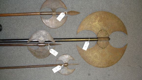Bonhams : Four Persian Double-Headed Axes