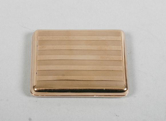 Bonhams : A 9ct gold sliding match flap holder