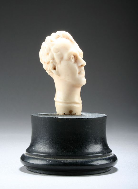 Bonhams : A 19th Century carved ivory walking-cane handle