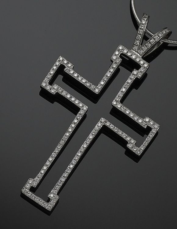 Bonhams : A diamond Outline cross pendant, by Theo Fennell,