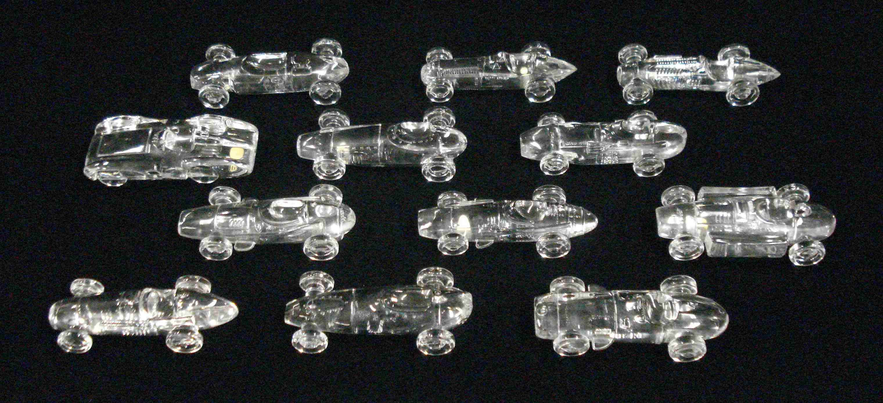 Bonhams Cars : A lot of crystal glass Grand Prix car models,