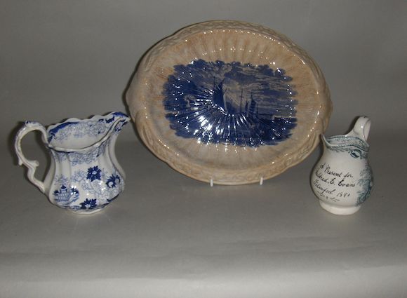 Bonhams : A Llanelly bread board and two jugs
