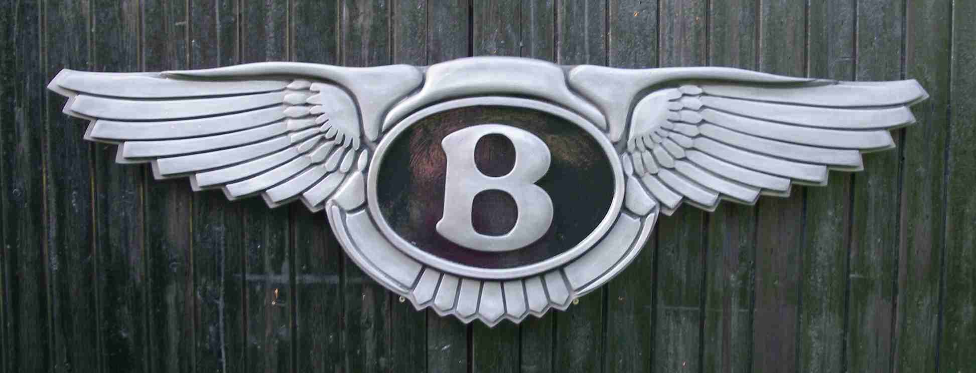 Bonhams Cars : A cold cast aluminium Bentley badge,