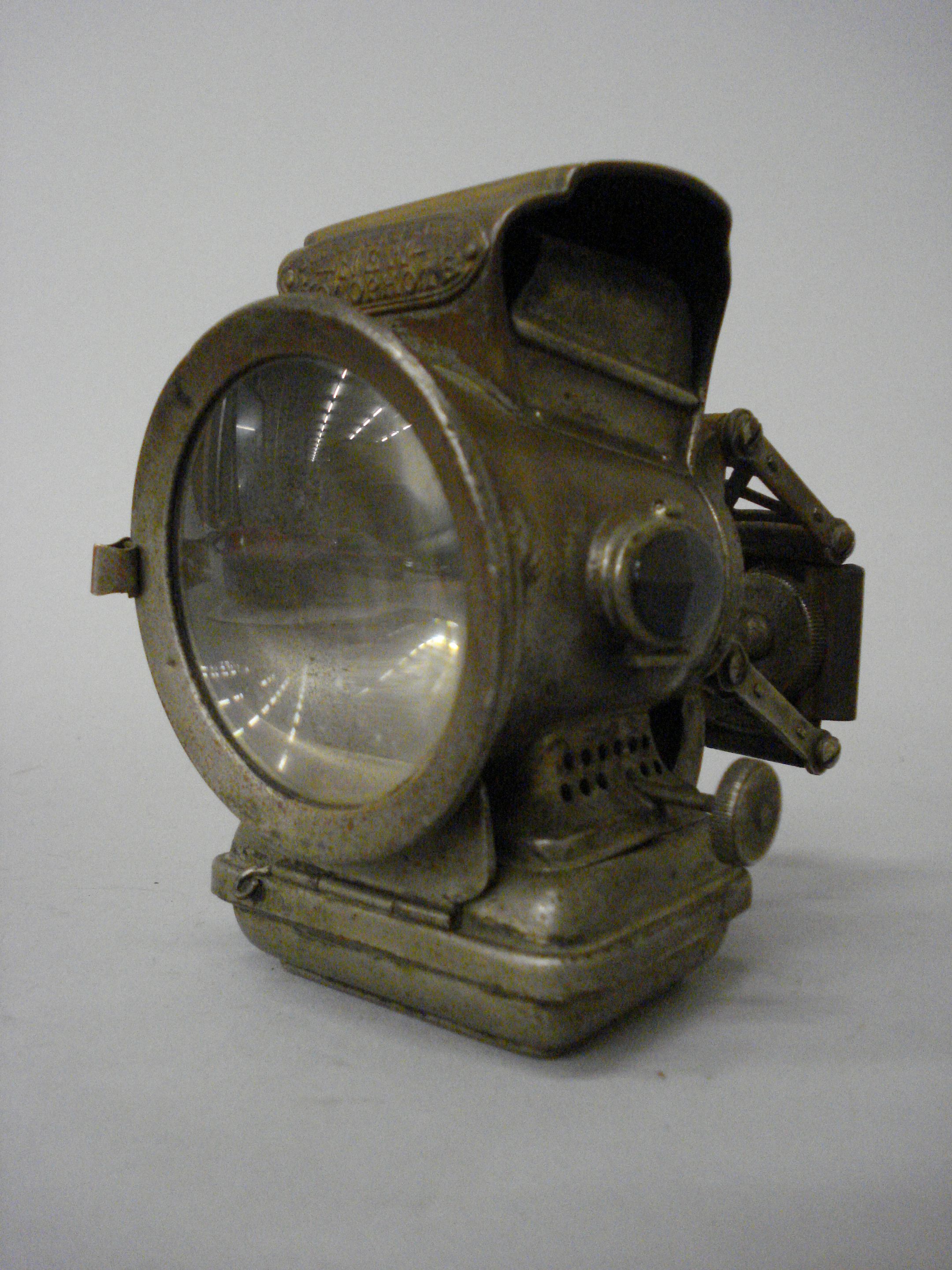 Bonhams Cars : A Lucas New Holophote oil illuminated cycle lamp,