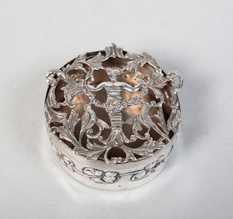 Bonhams : A circular box,