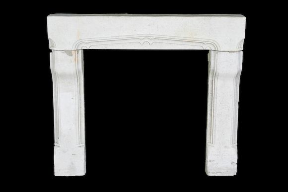 Bonhams : A Neo-Gothic style carved limestone chimneypiece