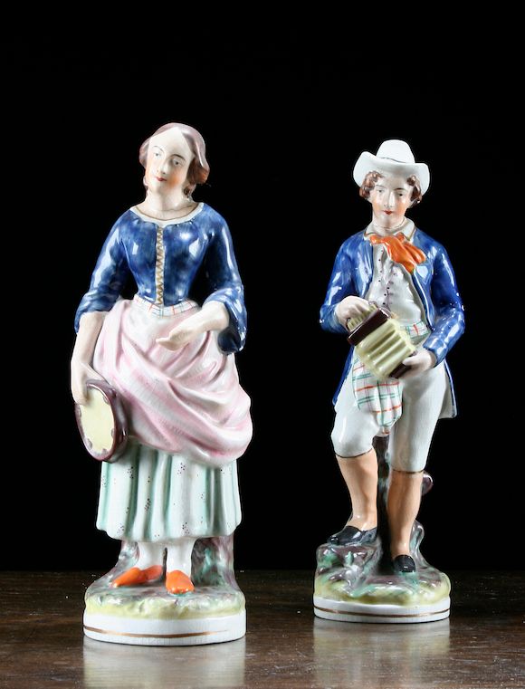 Bonhams : A pair of Staffordshire figures of musicians, circa 1870