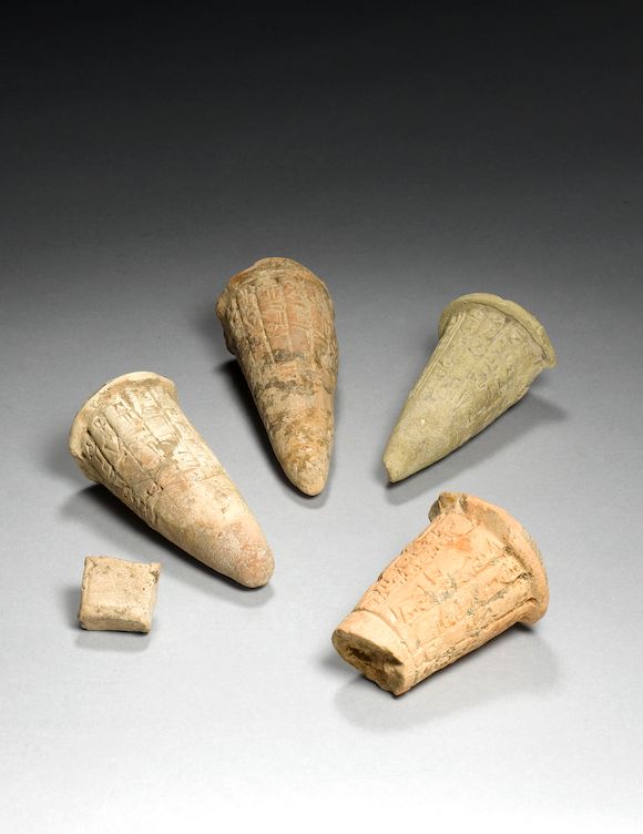 Bonhams : Four Sumerian terracotta foundation cones and a Sumerian clay ...