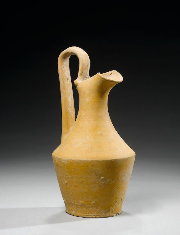 Bonhams : A Canosan pottery oinochoe