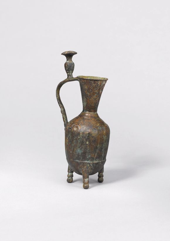 Bonhams : A small Tulunid/ Fatimid bronze Ewer Egypt, 9th Century