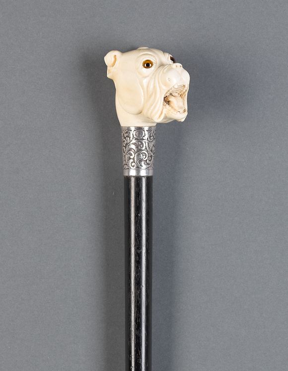 Bonhams : A 1930's ivory mounted dog walking cane,