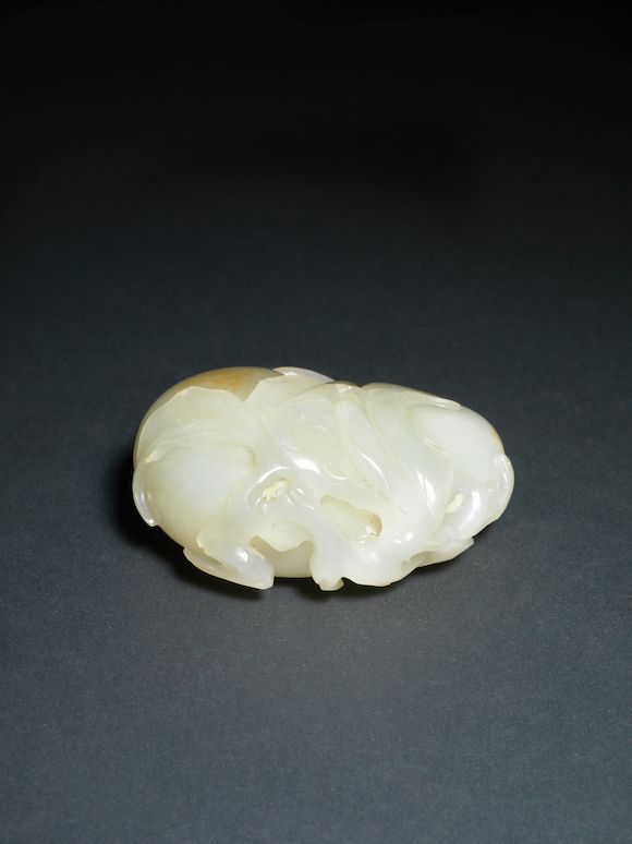 Bonhams : A white jade 'double-peach and bat' group 18th century