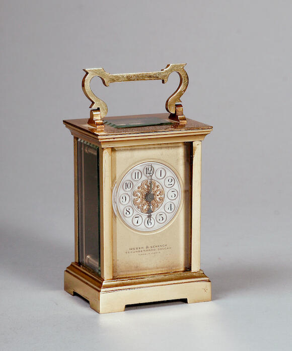 Bonhams : A late 19th Century gilt brass cased carriage timepiece