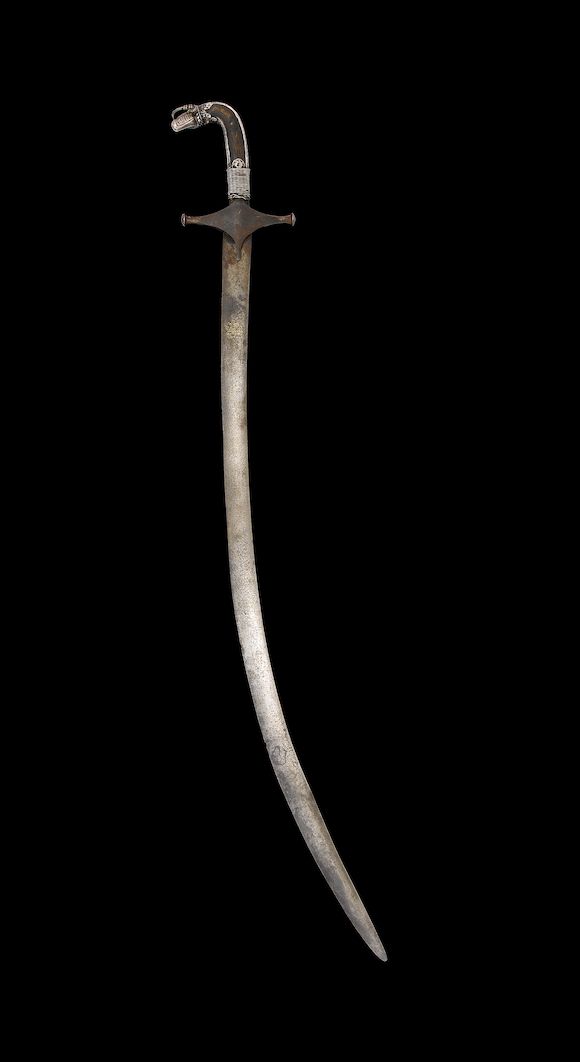 Bonhams : A Safavid steel Sword (shamshir), the blade signed as: the ...