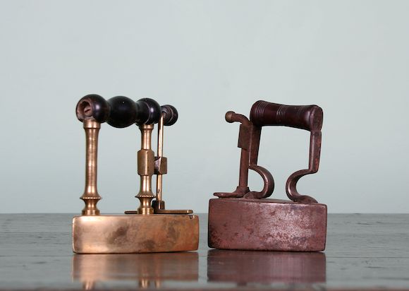 Bonhams : A small 19th Century brass lace iron, together with an iron ...