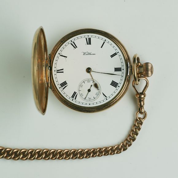 Bonhams : An 18ct gold fob watch on a chain