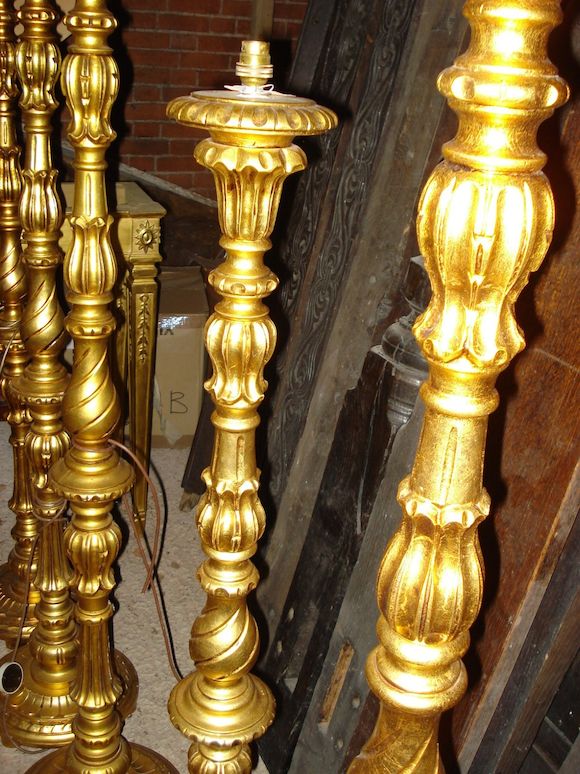 Bonhams : Five various carved giltwood Standard Lamp Bases,