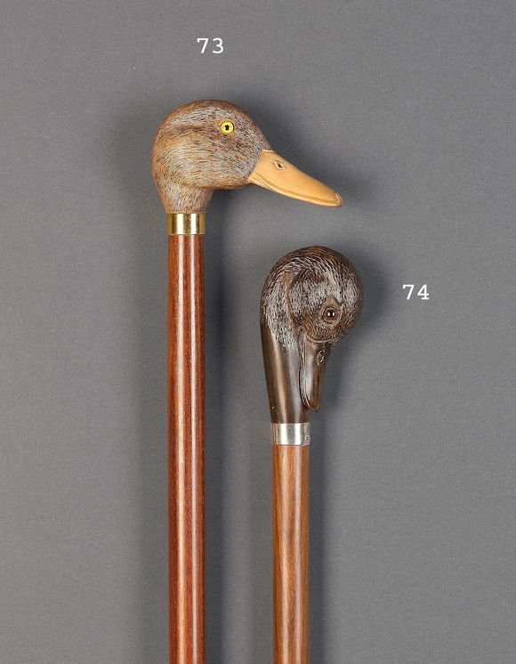 Bonhams : A contemporary silver and lignum vitae mounted swan walking ...