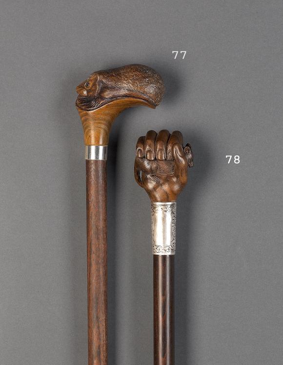 Bonhams A Contemporary Walnut Mounted Hand And Mouse Cane Signed S C R