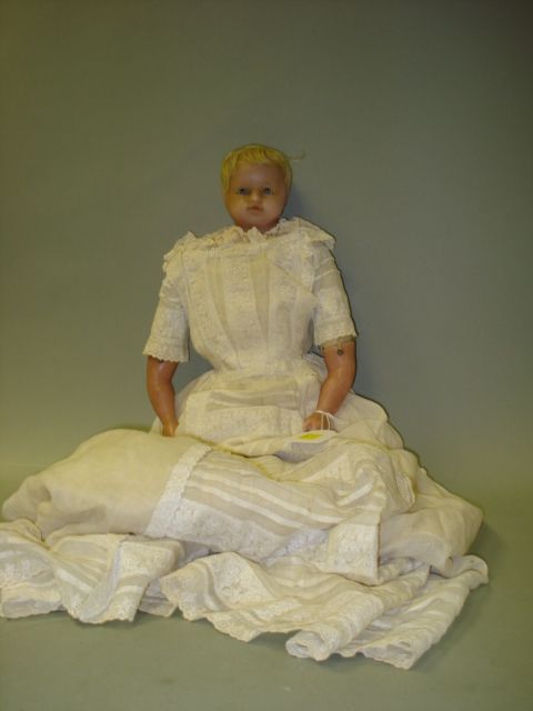 Bonhams : Poured wax shoulder head doll, English circa 1850
