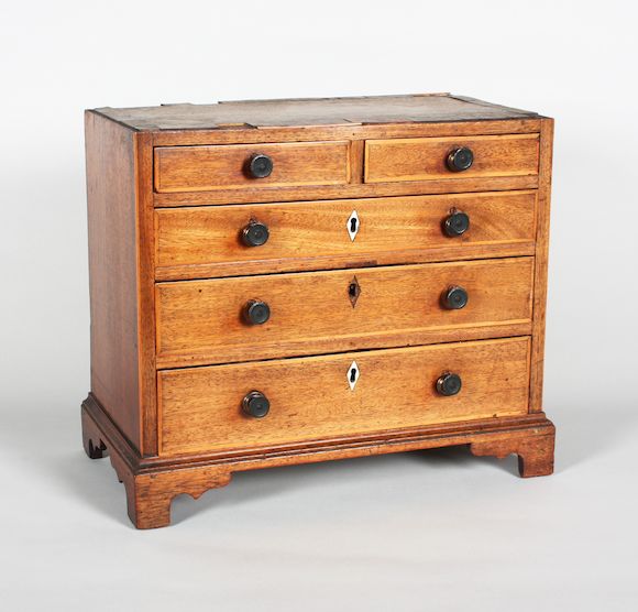Bonhams : Miniature Furniture: A 19th century mahogany and line edged five drawer chest
